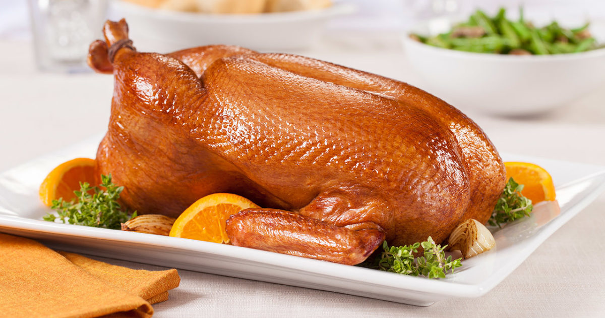 how long does it take to cook a whole duck in the oven