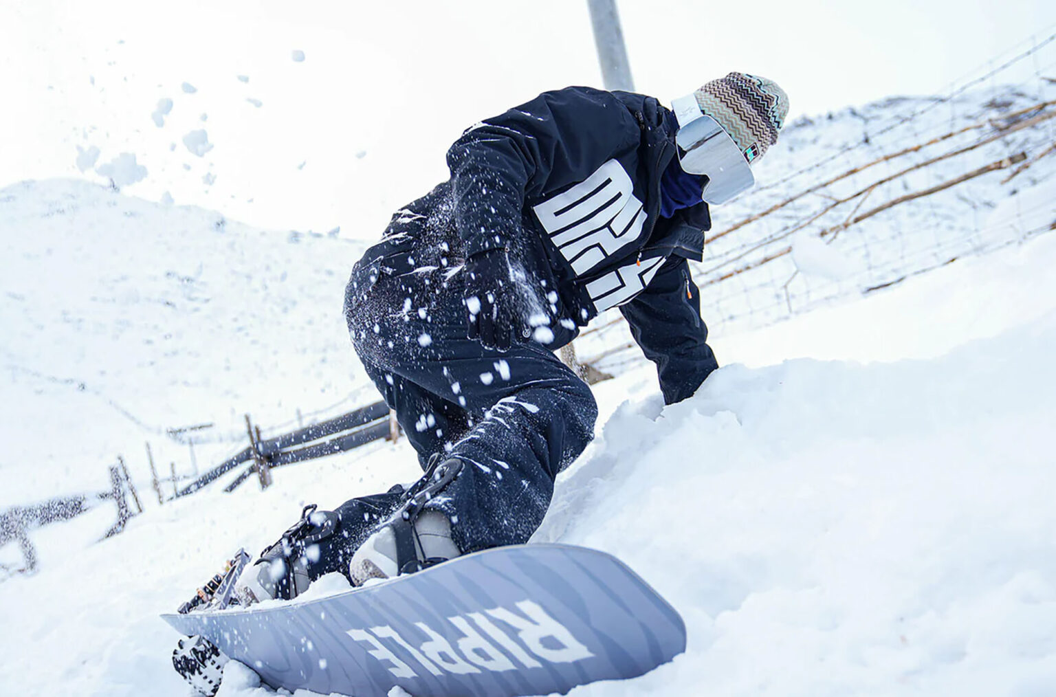 Meet the Electric-Powered Snowboard We're Still Not Sure We Need